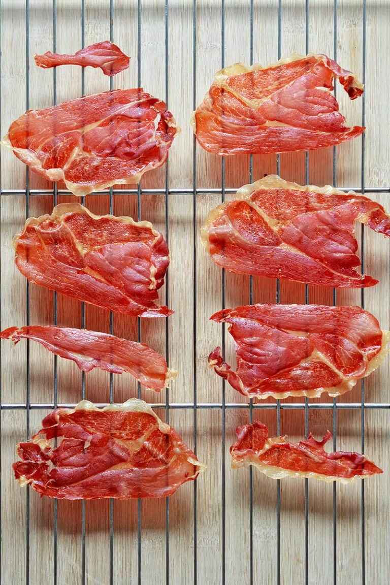 Swiss Chard with Raisins, Pine Nuts, and Crispy Prosciutto - Nom Nom Paleo®